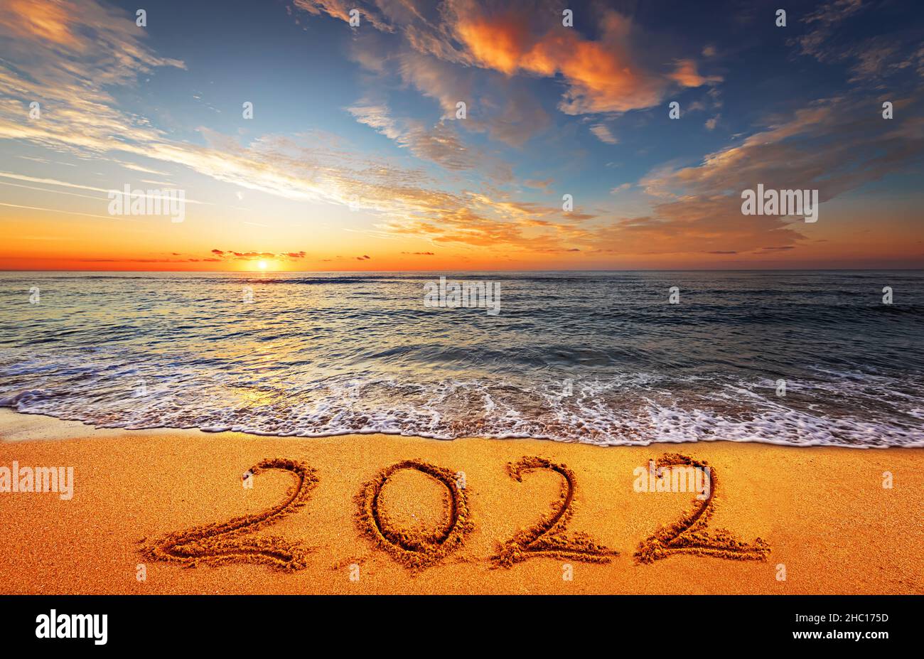 Sky background on sunset. Nature composition! Written 2022 on the beach ...