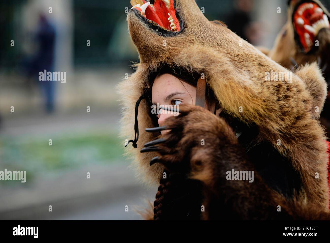 Bucharest, Romania - December 21, 2021: Young woman is wearing bear fur ...