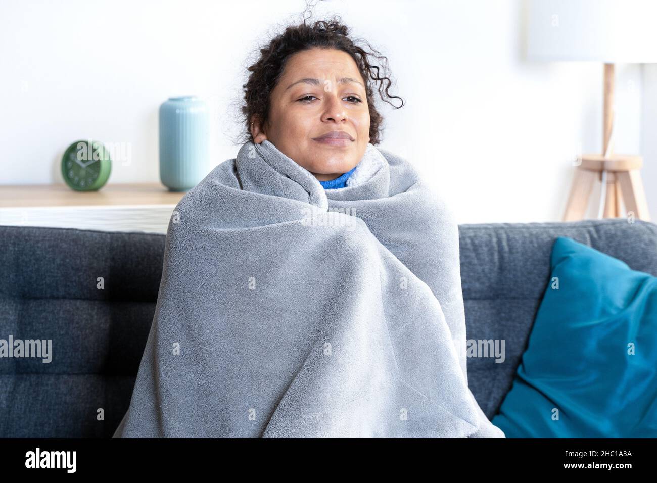 Woman cold house worried hi-res stock photography and images - Alamy
