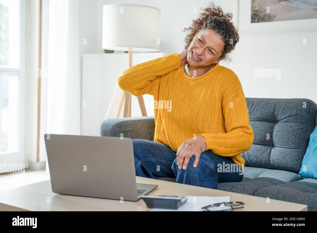 Bad Back Woman High Resolution Stock Photography and Images - Alamy