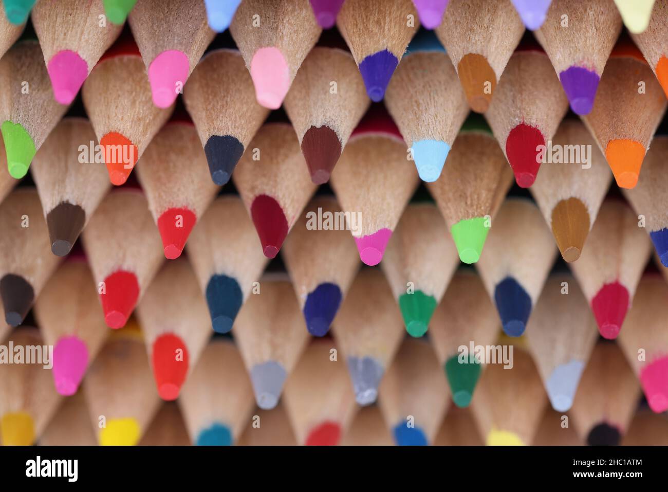 Sharpened colourful pencil set for painting forming stack placed on ...