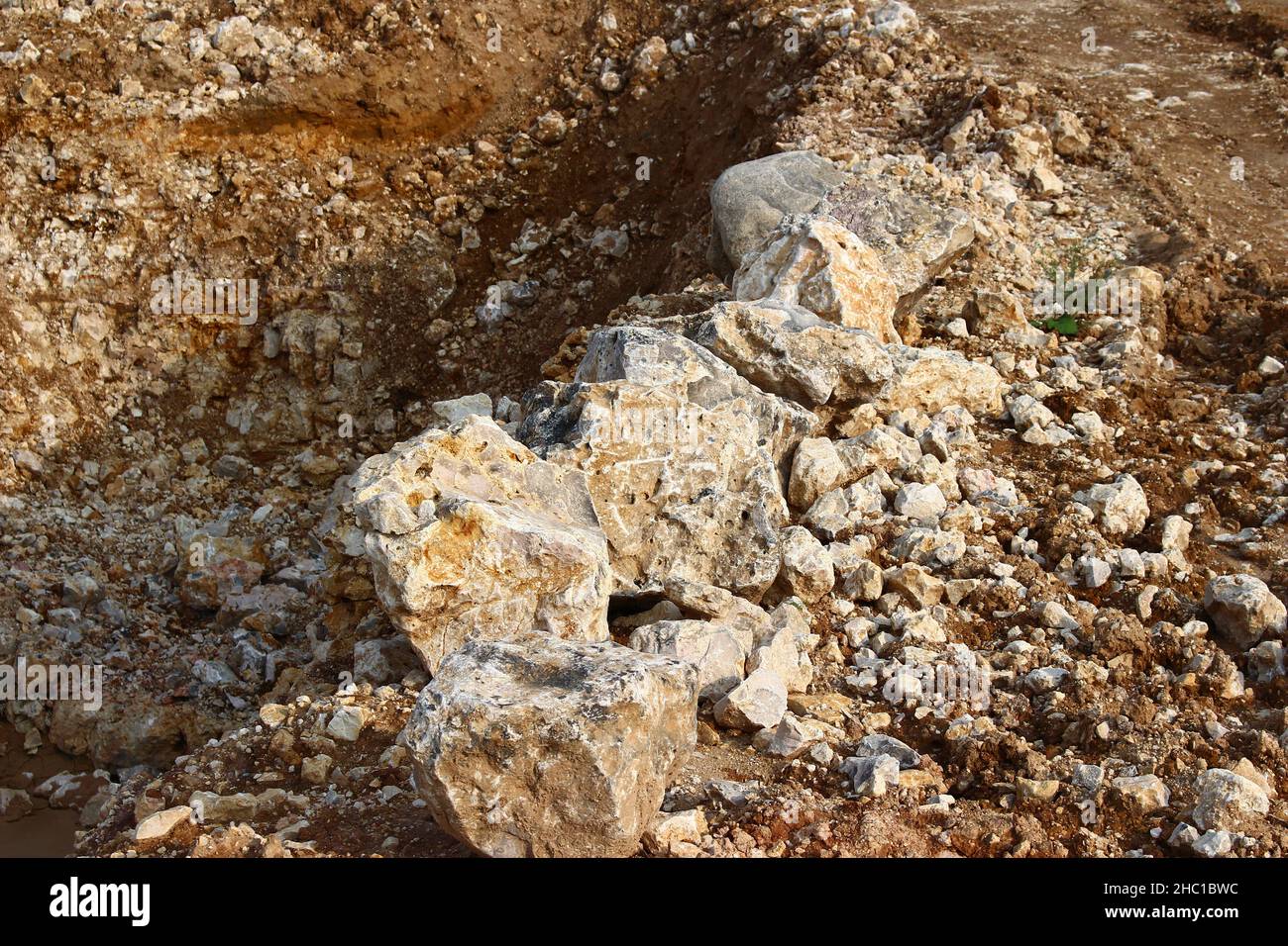 Large limestone boulders in a limestone quarry, extraction of building ...