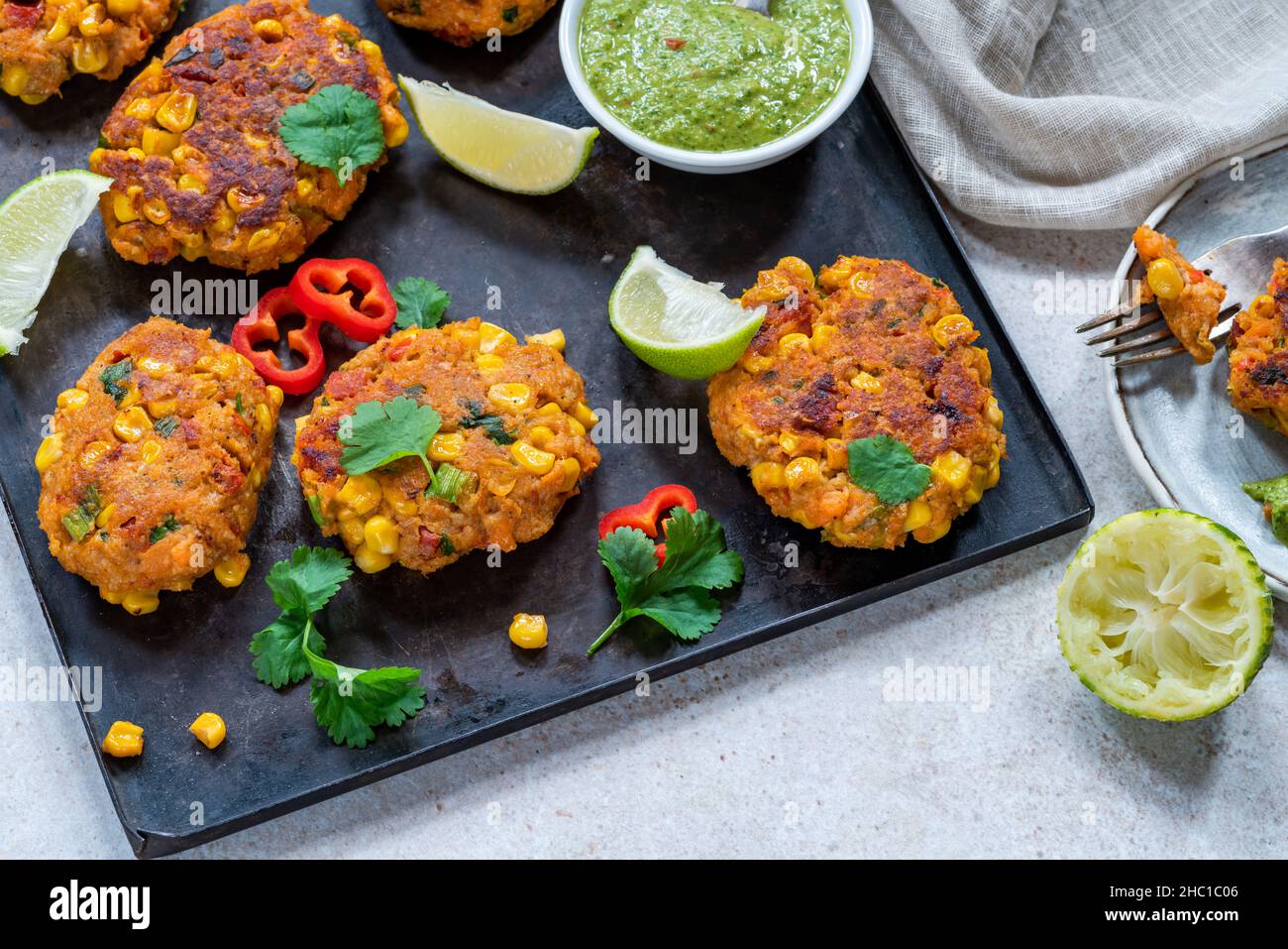 Spicy sweetcorn and sweet potato cakes with the fresh herb dip Stock ...
