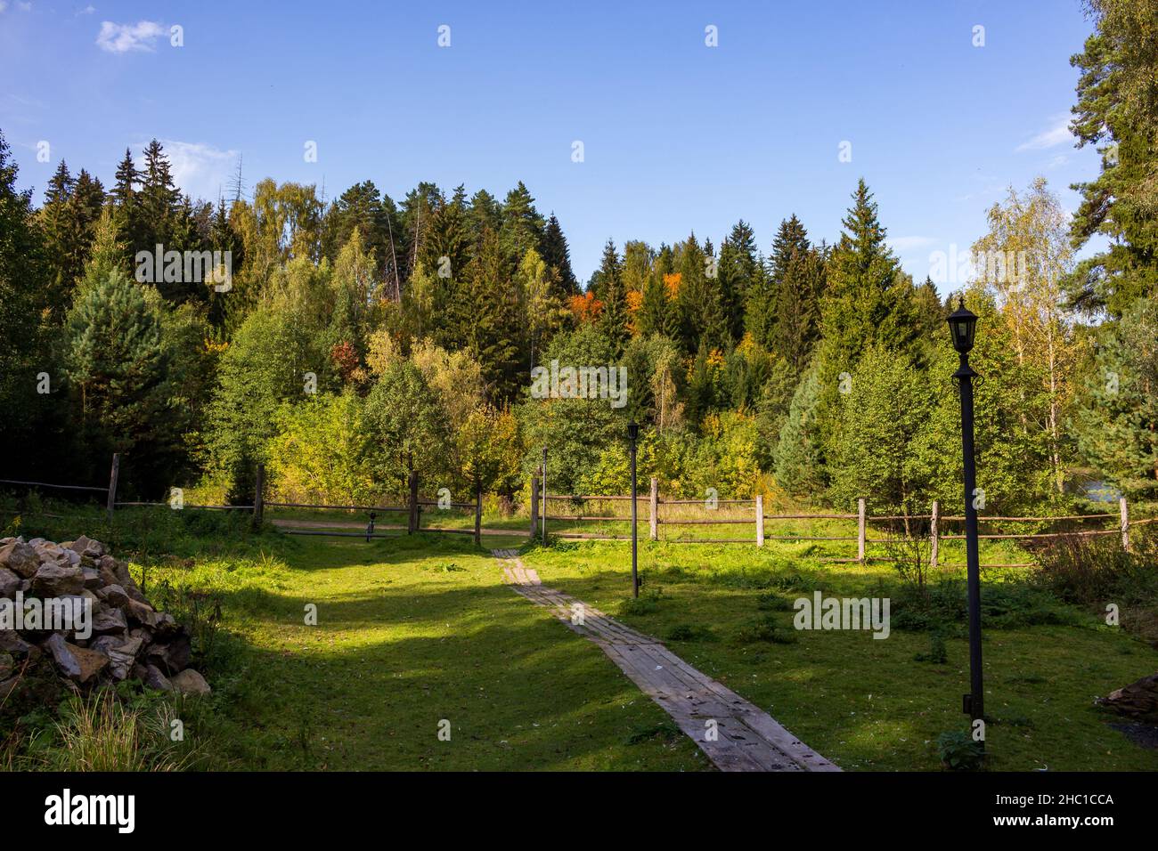 Countryside resting place with beautiful nature. Plank path and ...