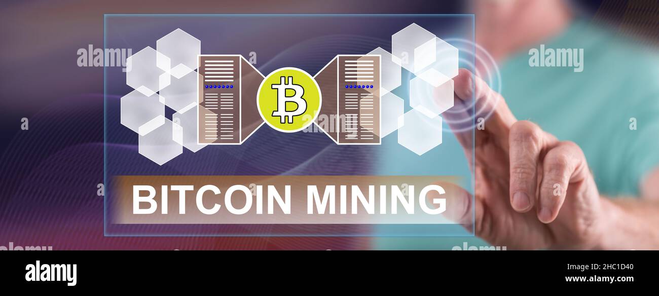Man touching a bitcoin mining concept on a touch screen with his finger ...