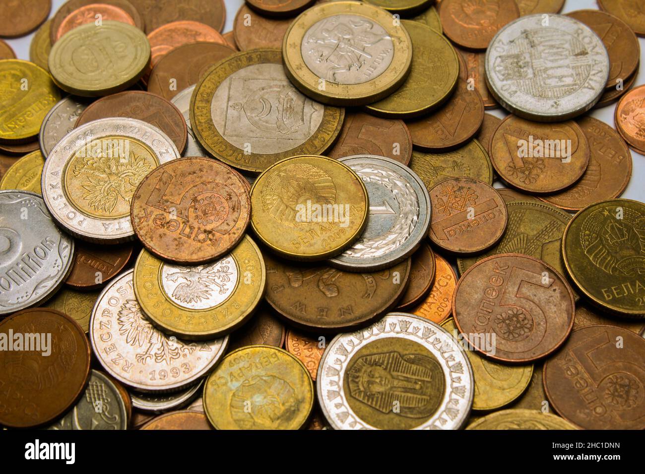 background of coins from different countries Stock Photo - Alamy