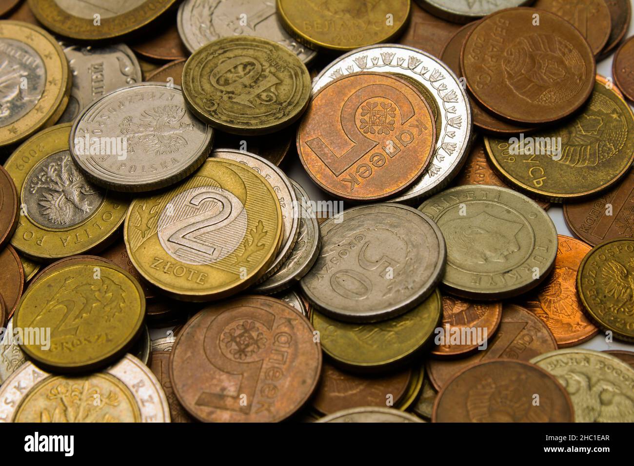 background of coins from different countries Stock Photo - Alamy