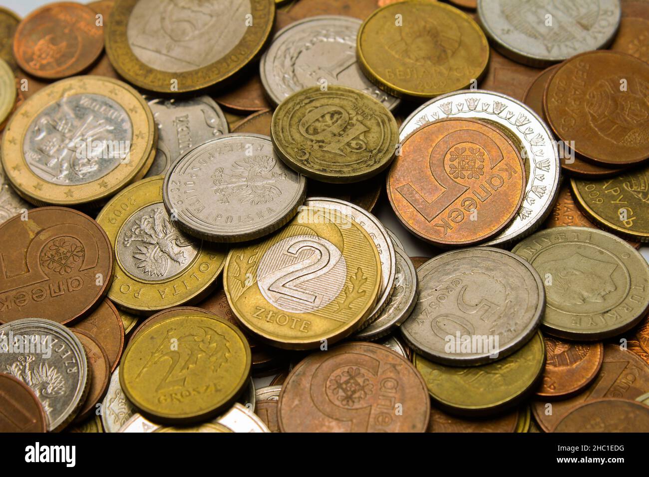 background of coins from different countries Stock Photo - Alamy