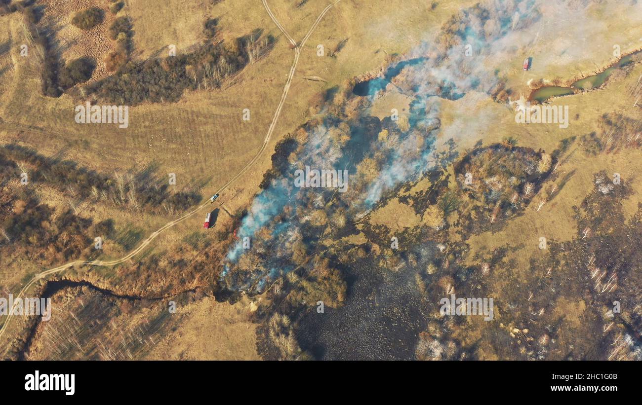 Aerial View. Spring Dry Grass Burns During Drought Hot Weather. Bush ...