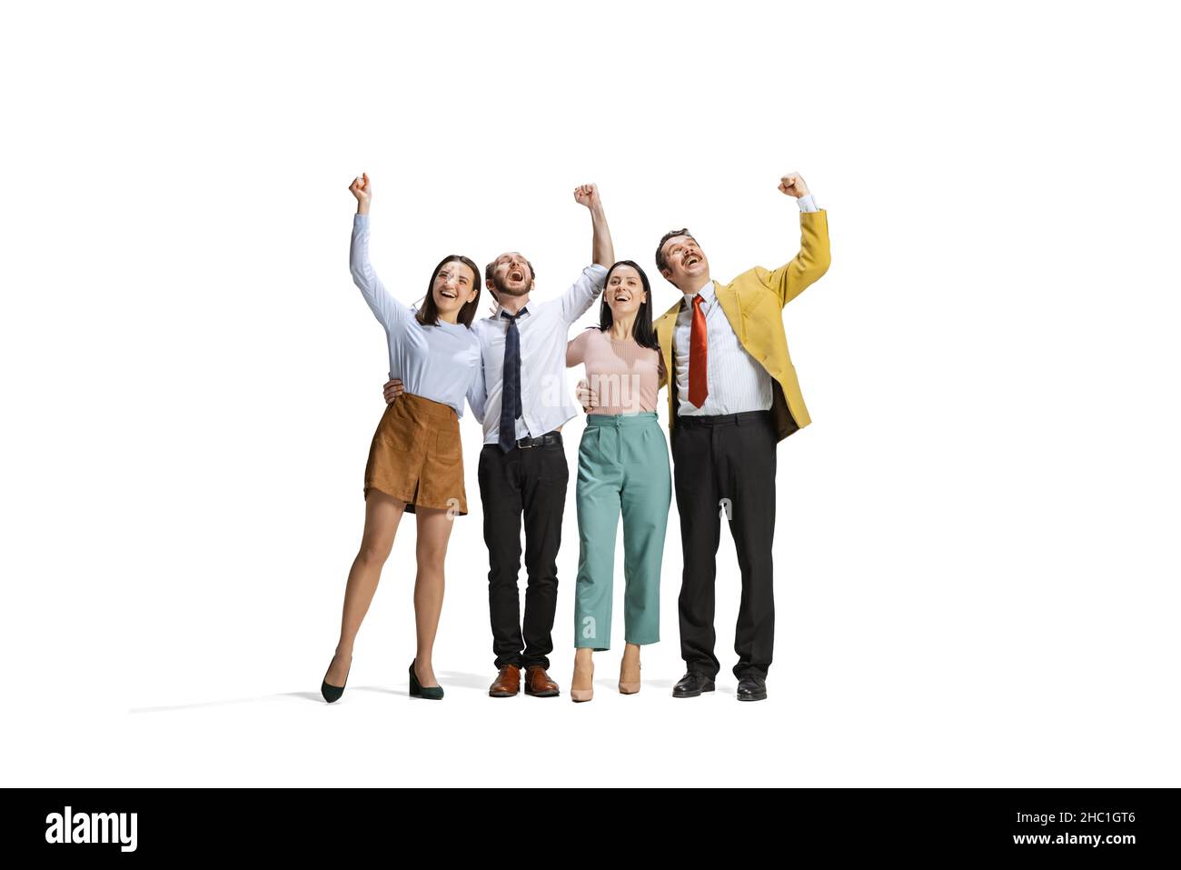 Full-length portrait of happy and excited employees, workers ...