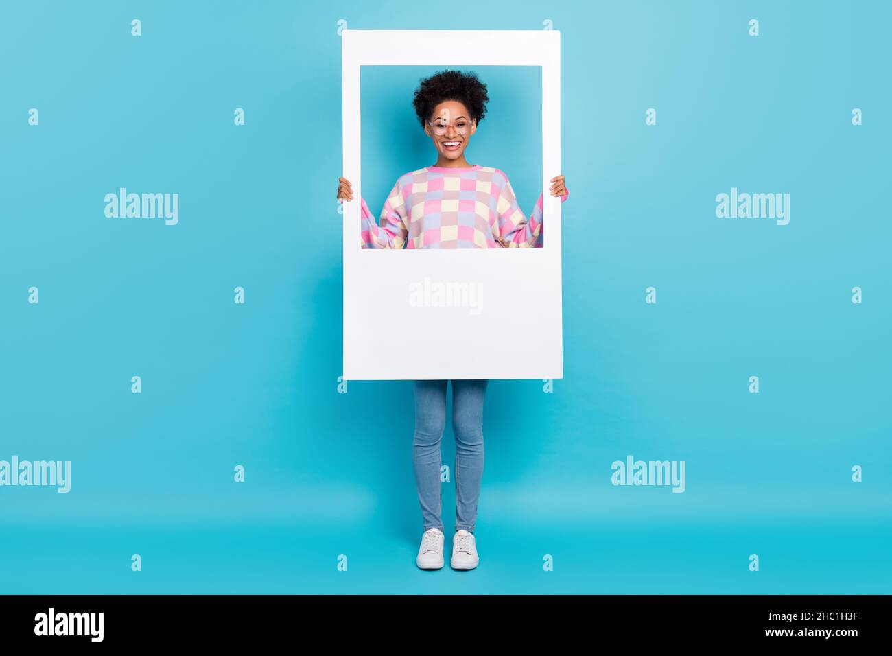 Full length body size view of attractive cheerful girl holding picture ...