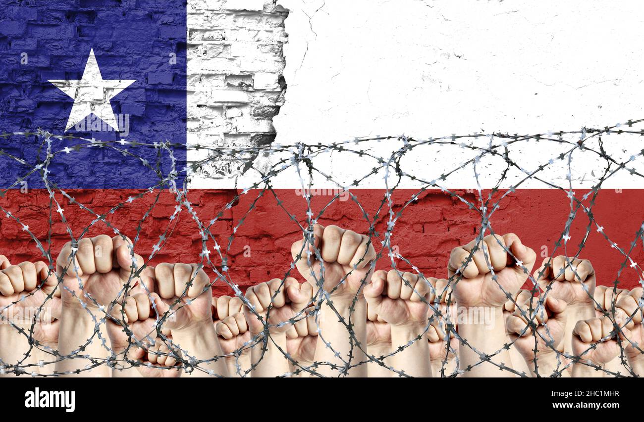 Barbed wire against the background of the inflicted flag of Chile and ...