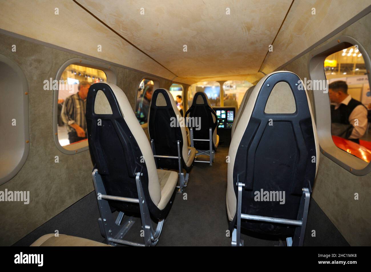 Interior of a passenger helicopter salon, seats and window shades Stock ...