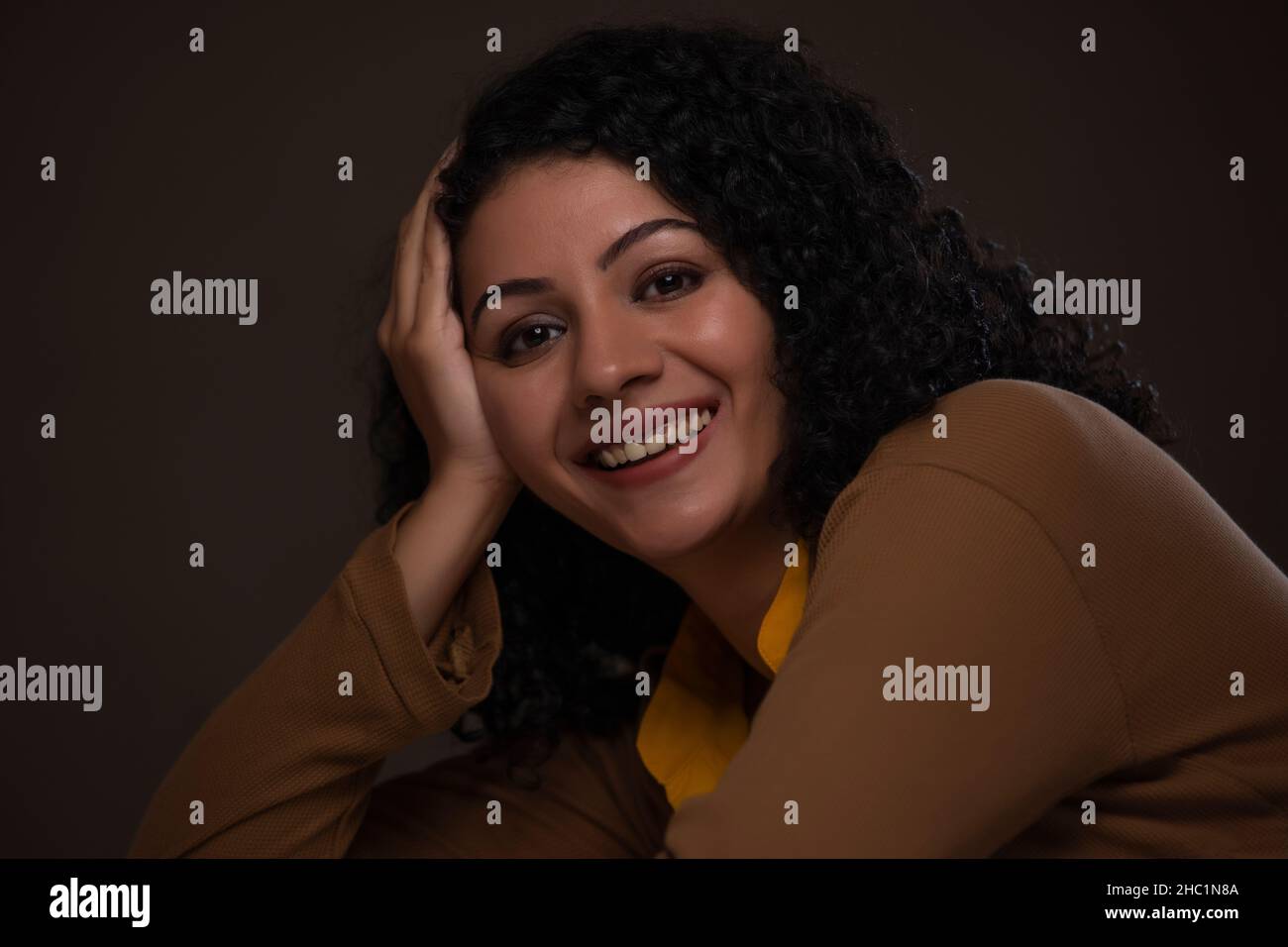 Woman resting head on hand hi-res stock photography and images - Alamy