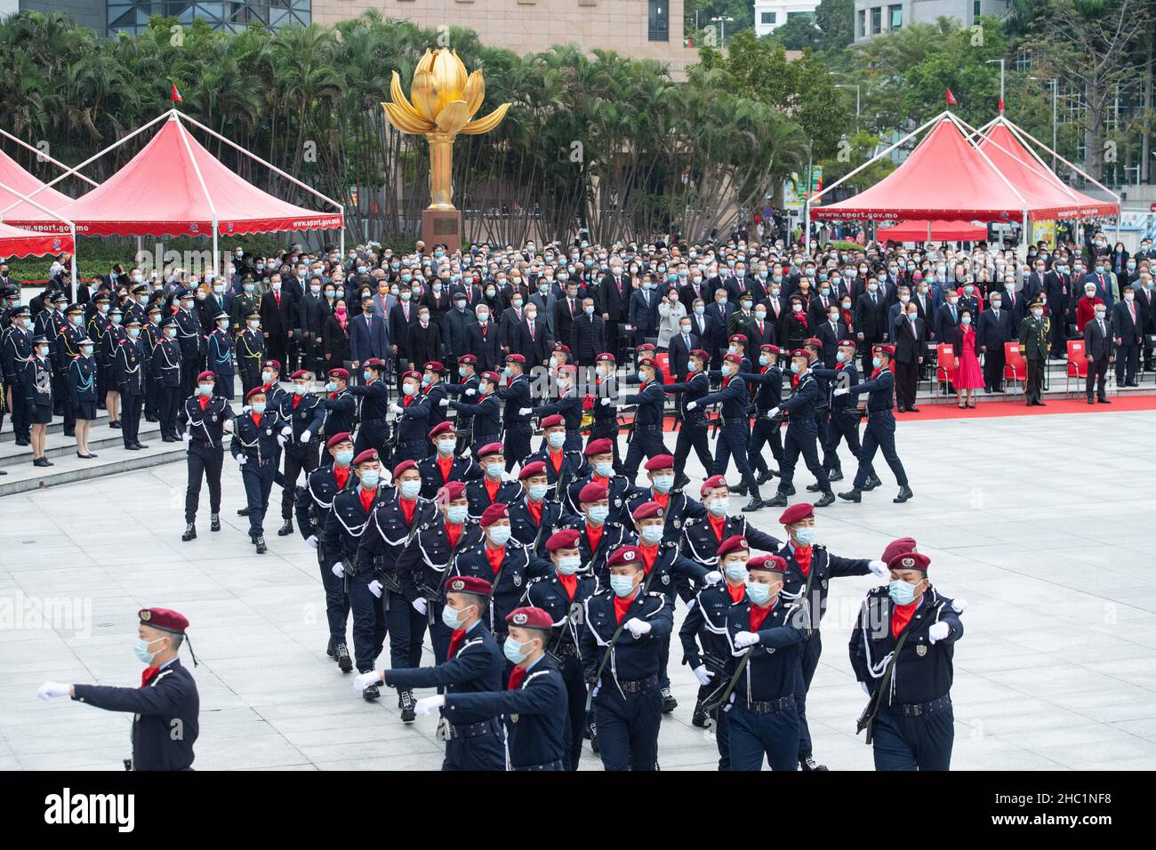 (211220) -- MACAO, Dec. 20, 2021 (Xinhua) -- A flag-raising ceremony ...