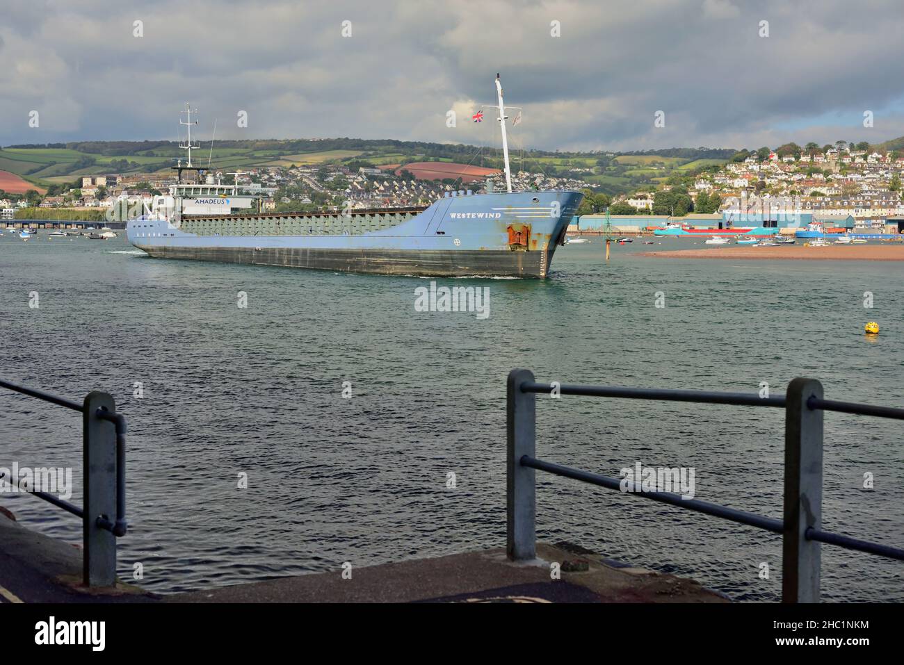 General cargo ship Westewinde leaving Teignmouth harbour at high tide ...