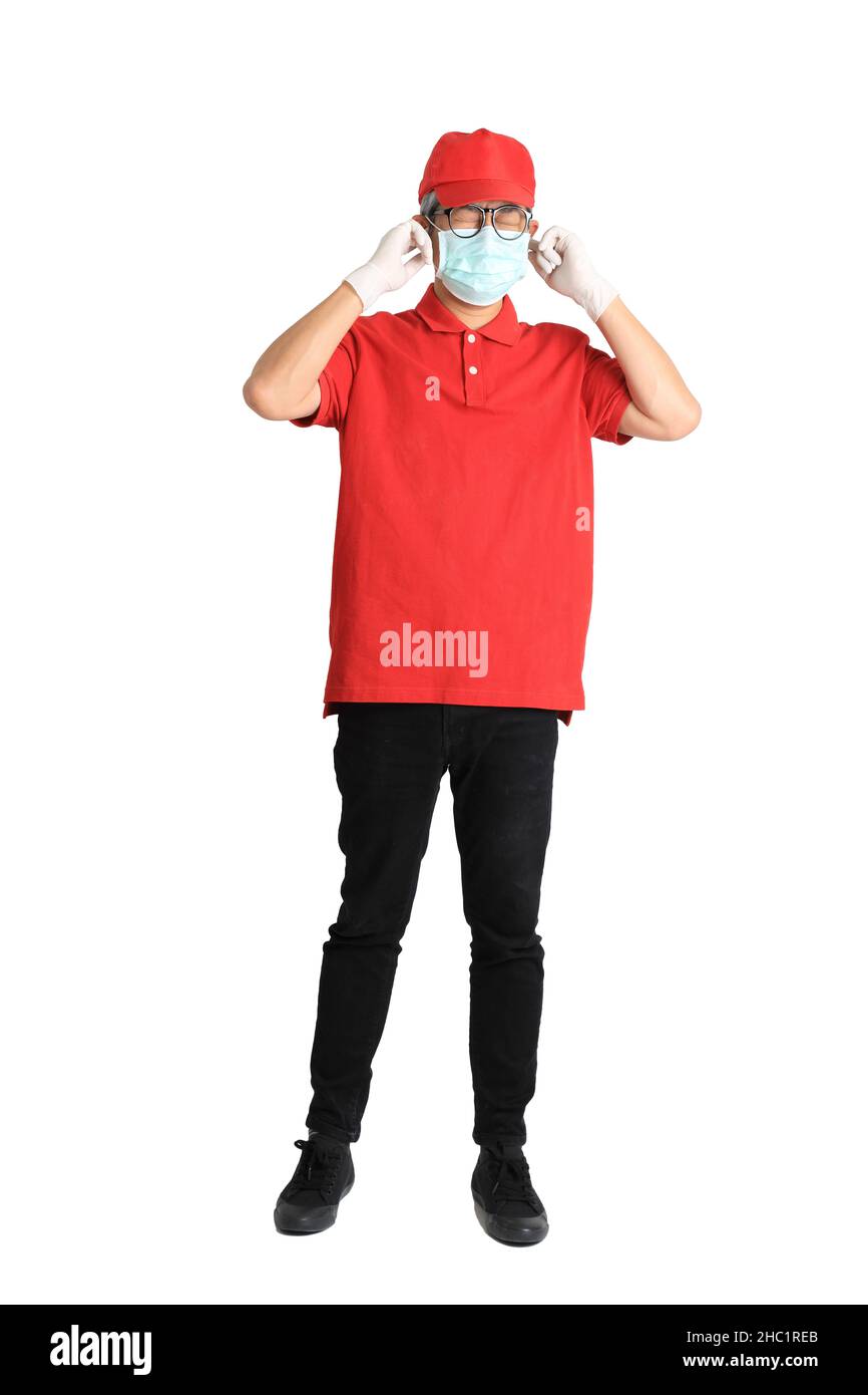 The senior Asian postman with face mask on the white background Stock ...