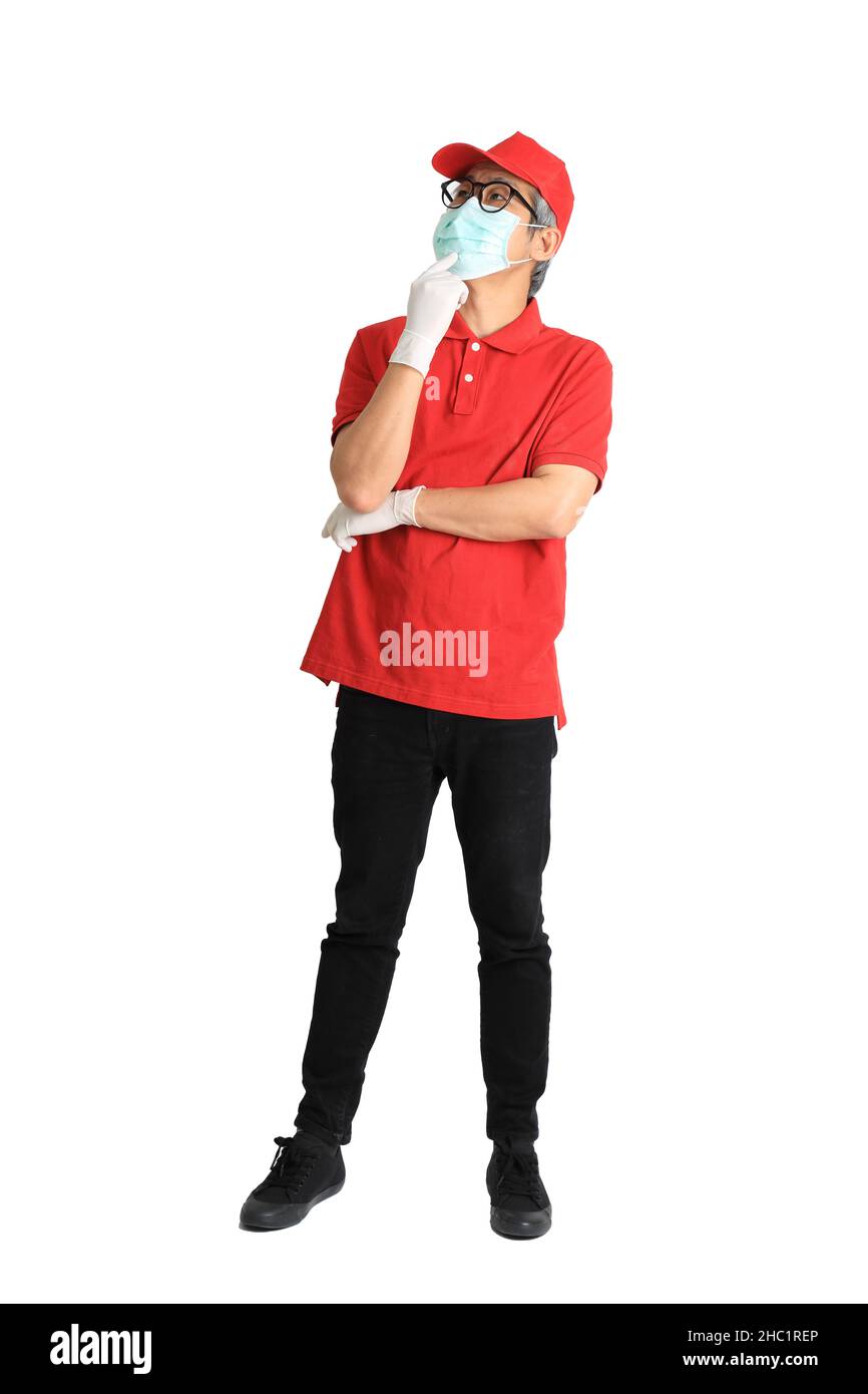 The senior Asian postman with face mask on the white background Stock ...