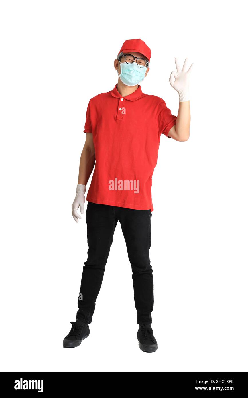 The senior Asian postman with face mask on the white background Stock ...
