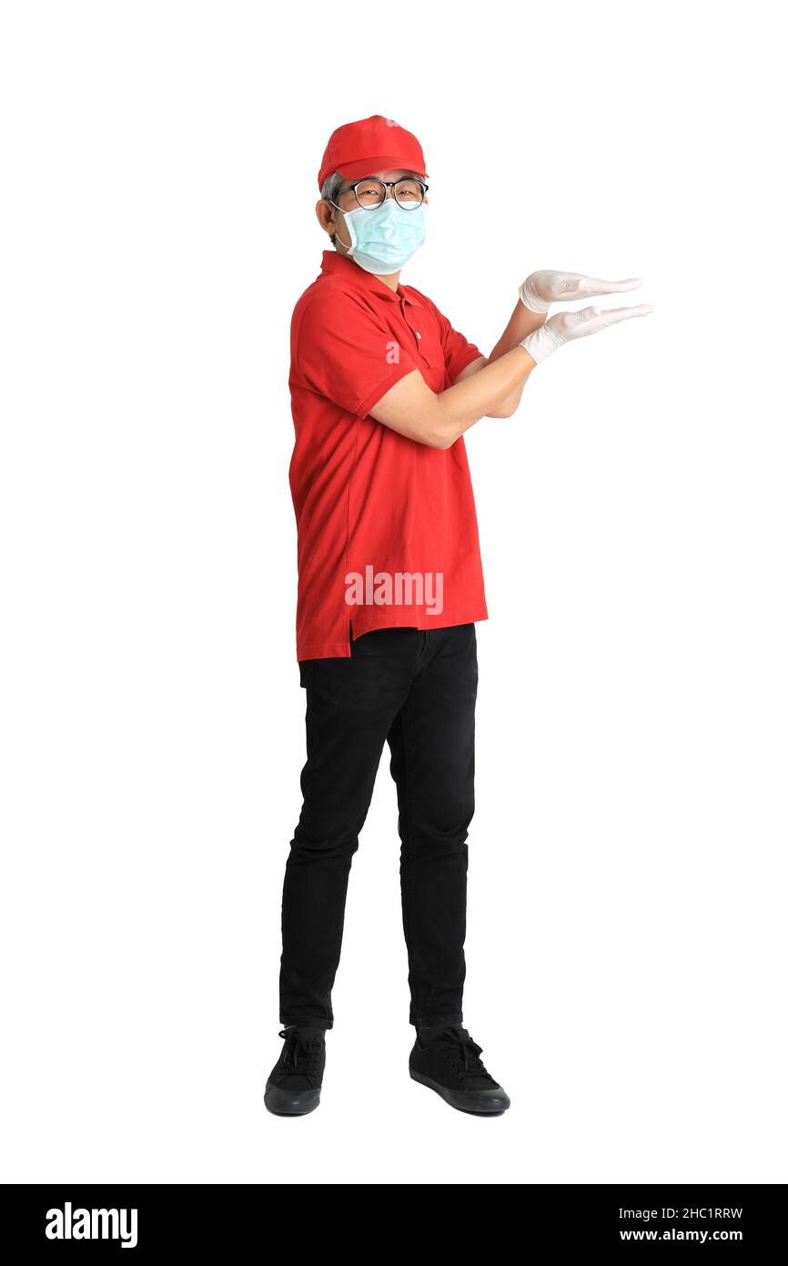 The senior Asian postman with face mask on the white background Stock ...