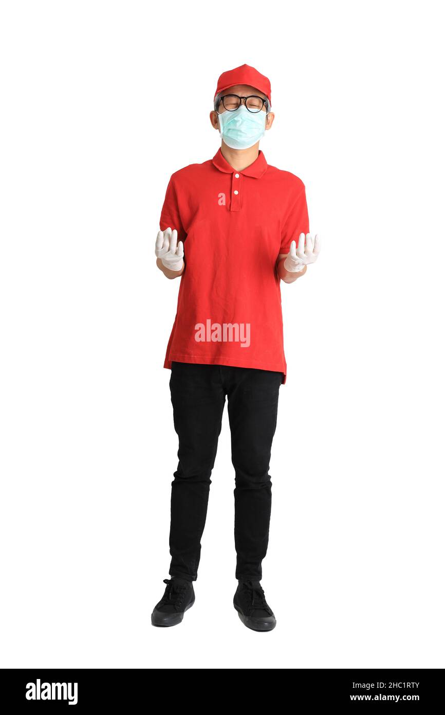 The senior Asian postman with face mask on the white background Stock ...