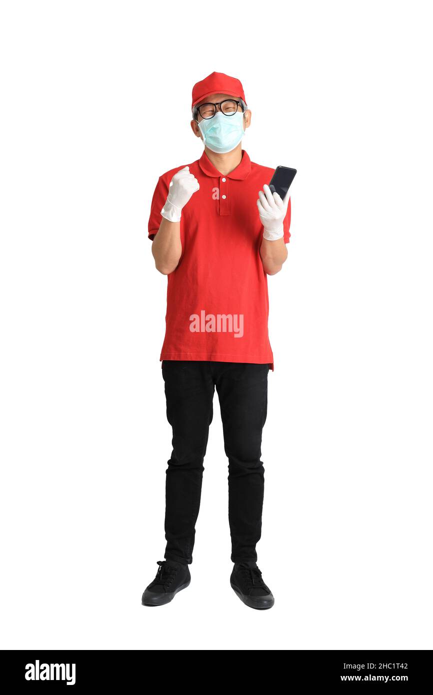 The senior Asian postman with face mask on the white background Stock ...