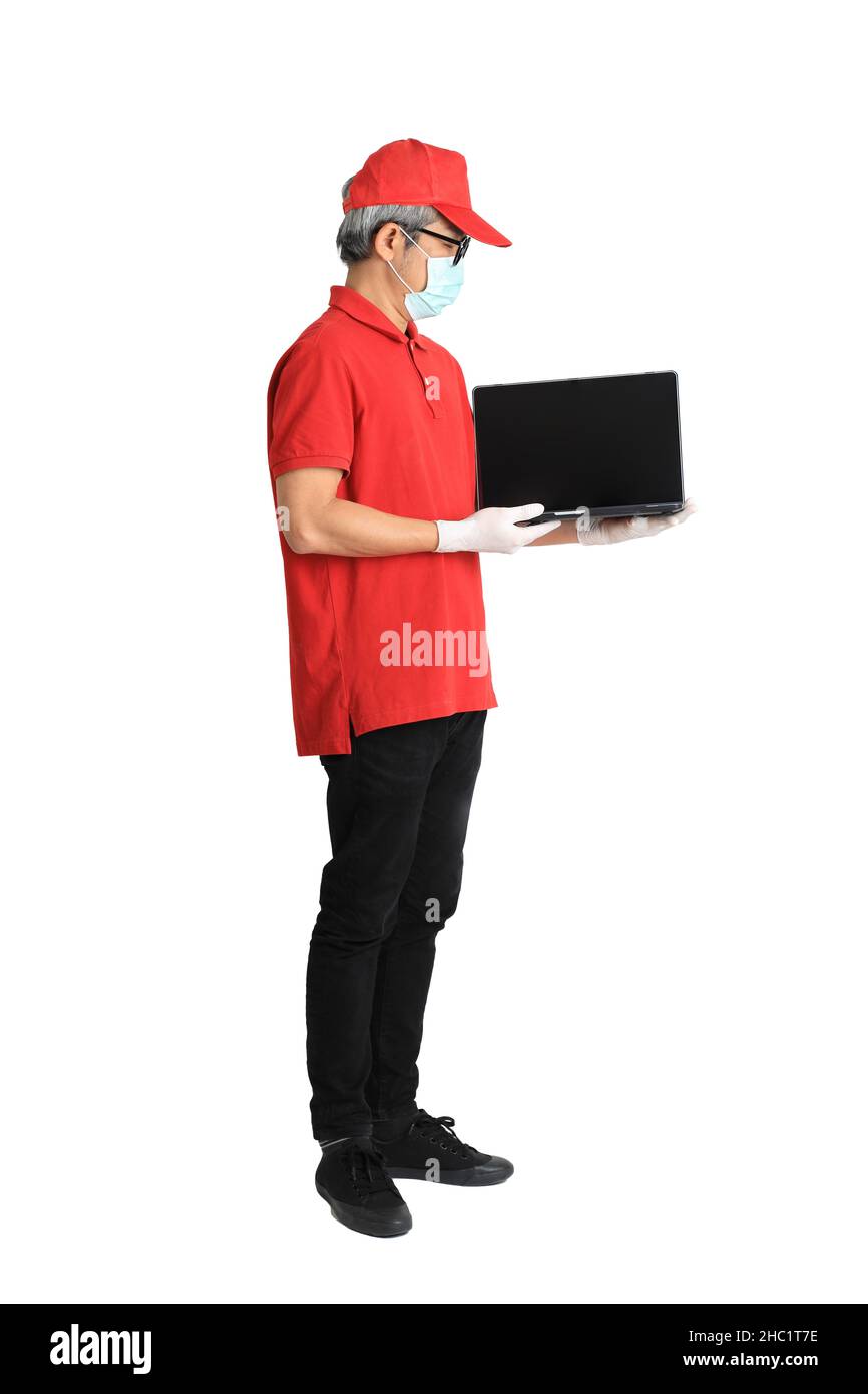 The senior Asian postman with face mask on the white background Stock ...