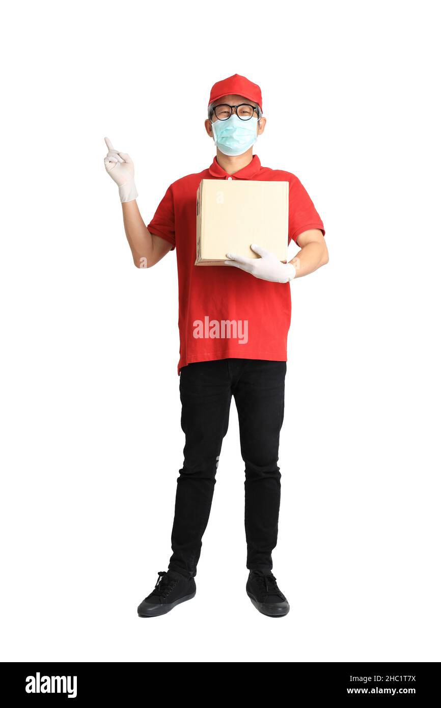 The senior Asian postman with face mask on the white background Stock ...