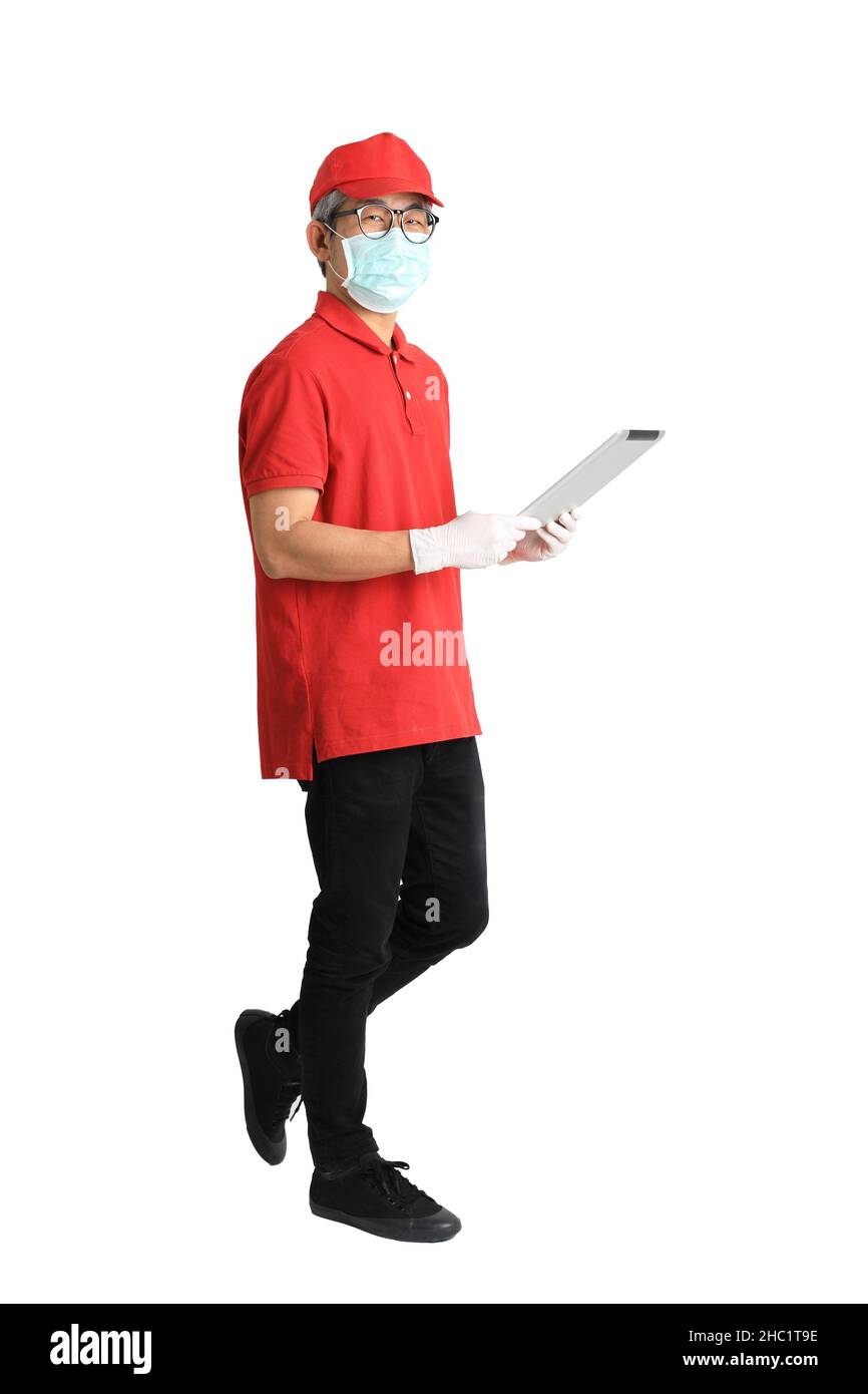 The senior Asian postman with face mask on the white background Stock ...