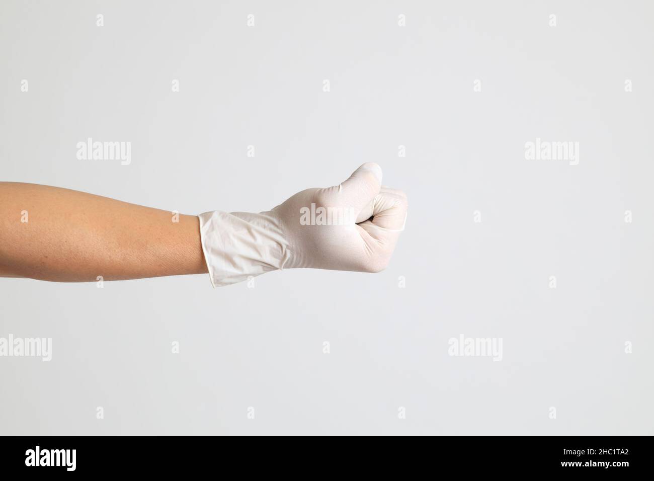 The human hand with glove on the white background Stock Photo - Alamy