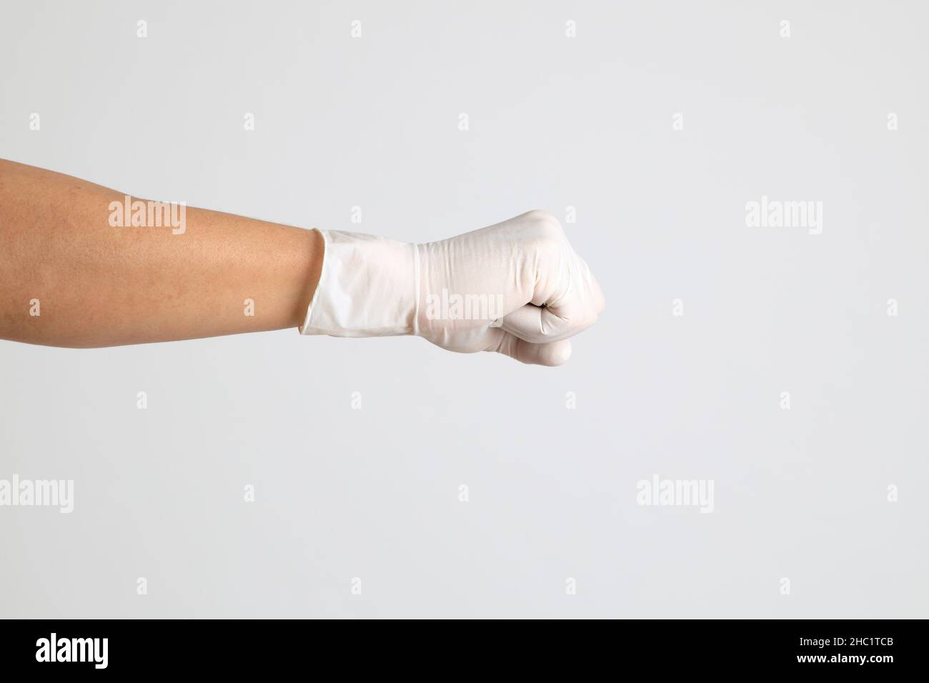 The human hand with glove on the white background Stock Photo - Alamy