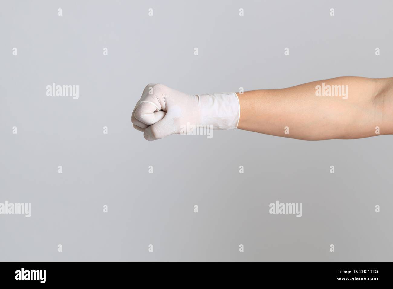 The human hand with glove on the white background Stock Photo - Alamy