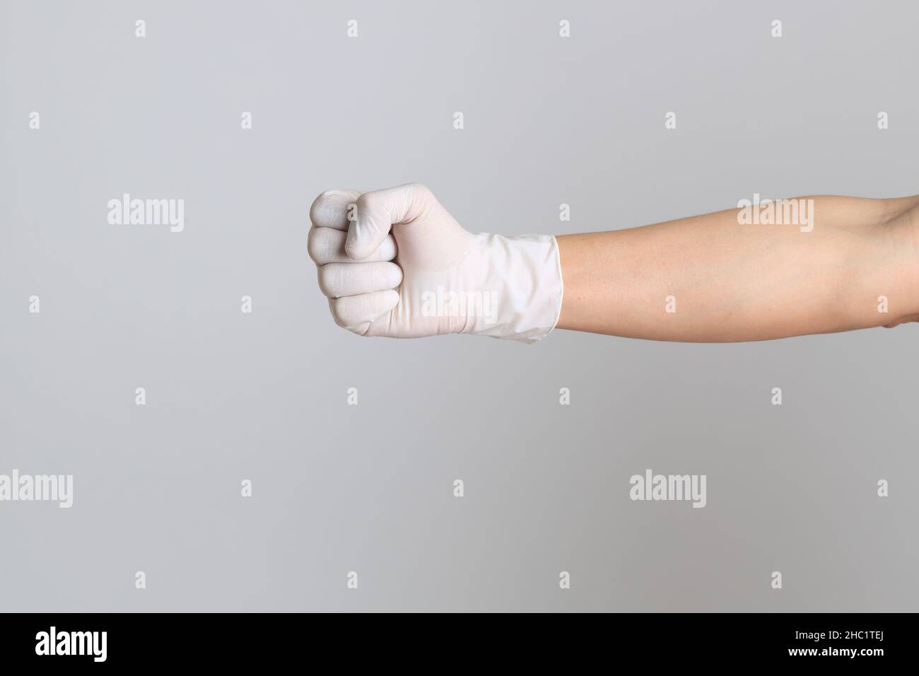 The human hand with glove on the white background Stock Photo - Alamy