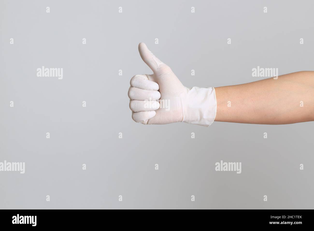 The human hand with glove on the white background Stock Photo - Alamy