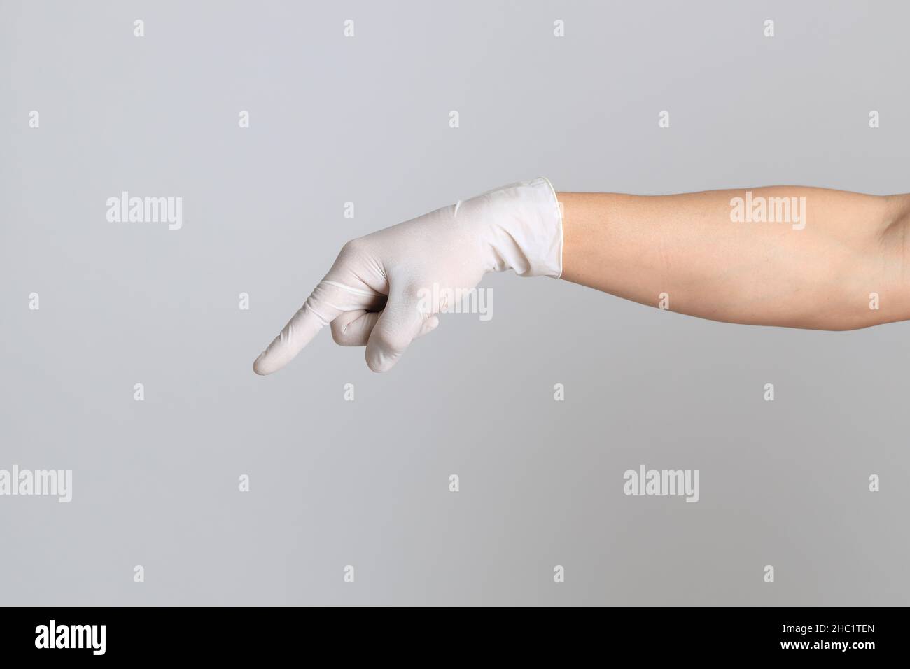 The human hand with glove on the white background Stock Photo - Alamy