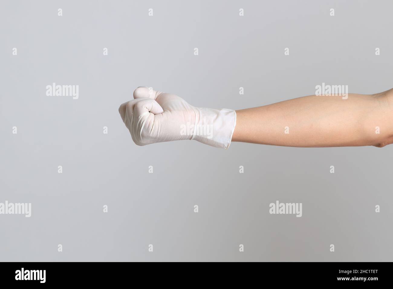 The human hand with glove on the white background Stock Photo - Alamy