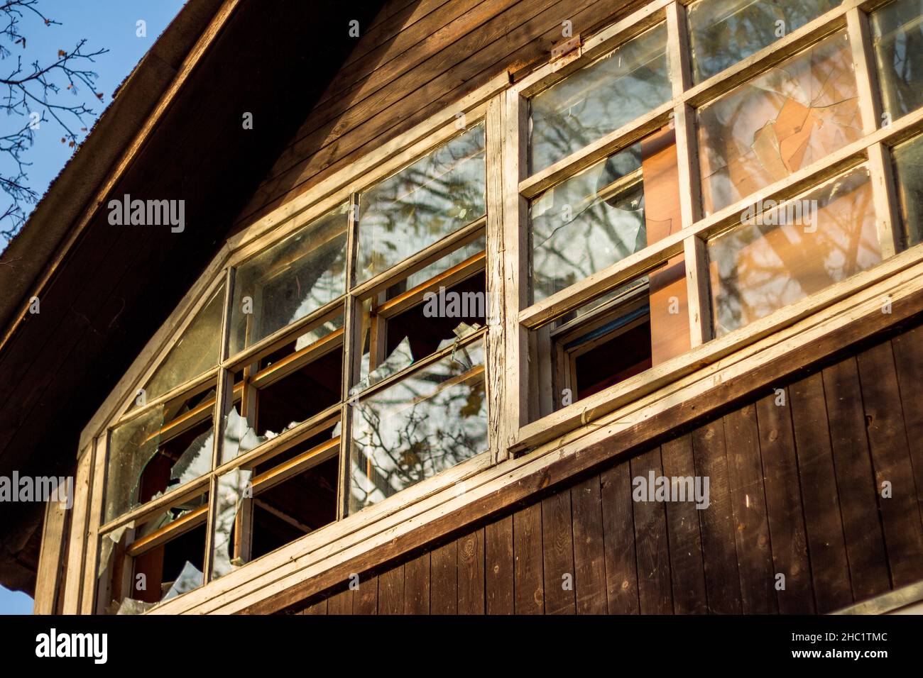 Broken window panes in a country wooden house Stock Photo - Alamy