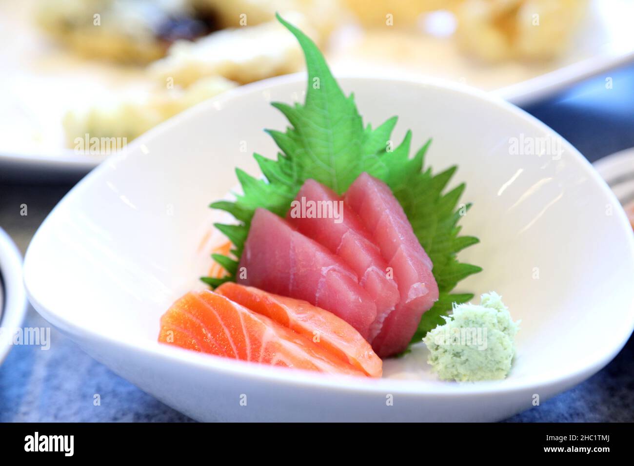 The Japanese dish named sashimi in the white bowl Stock Photo - Alamy