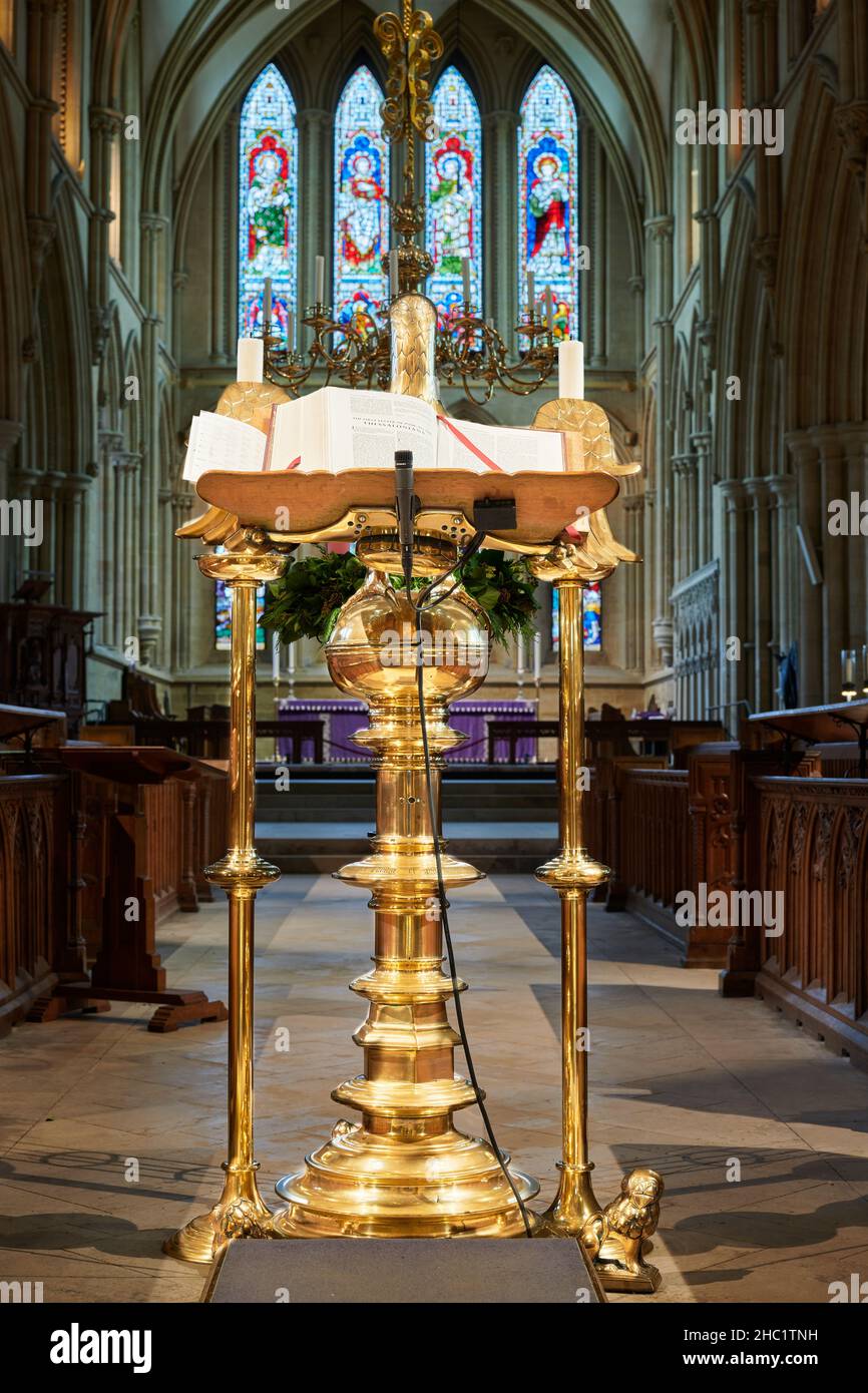 Open bible on a lectern in the choir of the church at Southwell ...