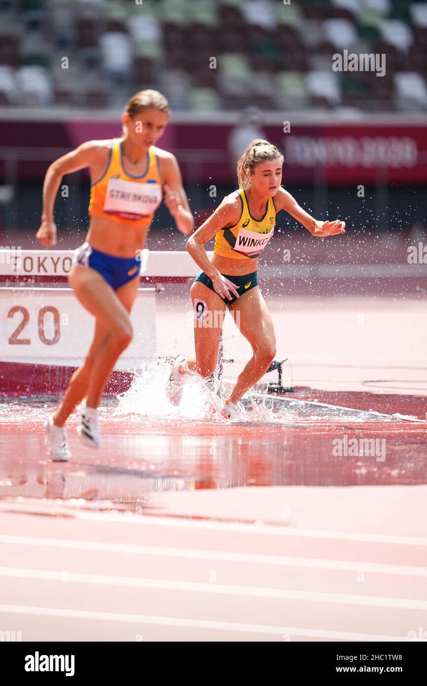Georgia Winkcup participating in the 3000 meters steeplechase at the ...