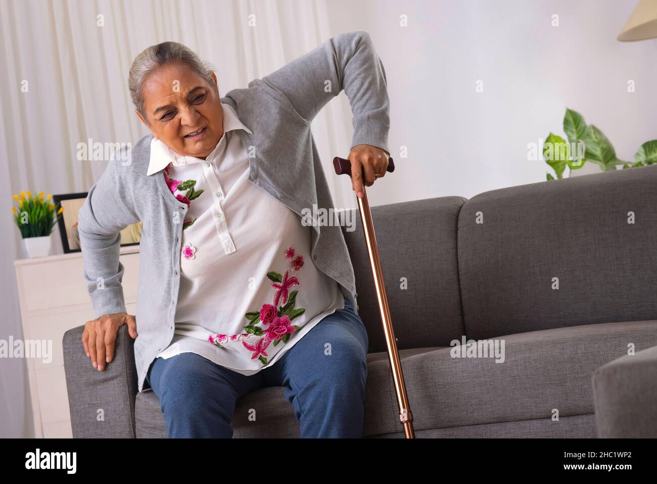 60 years old woman walking stick hi-res stock photography and images ...