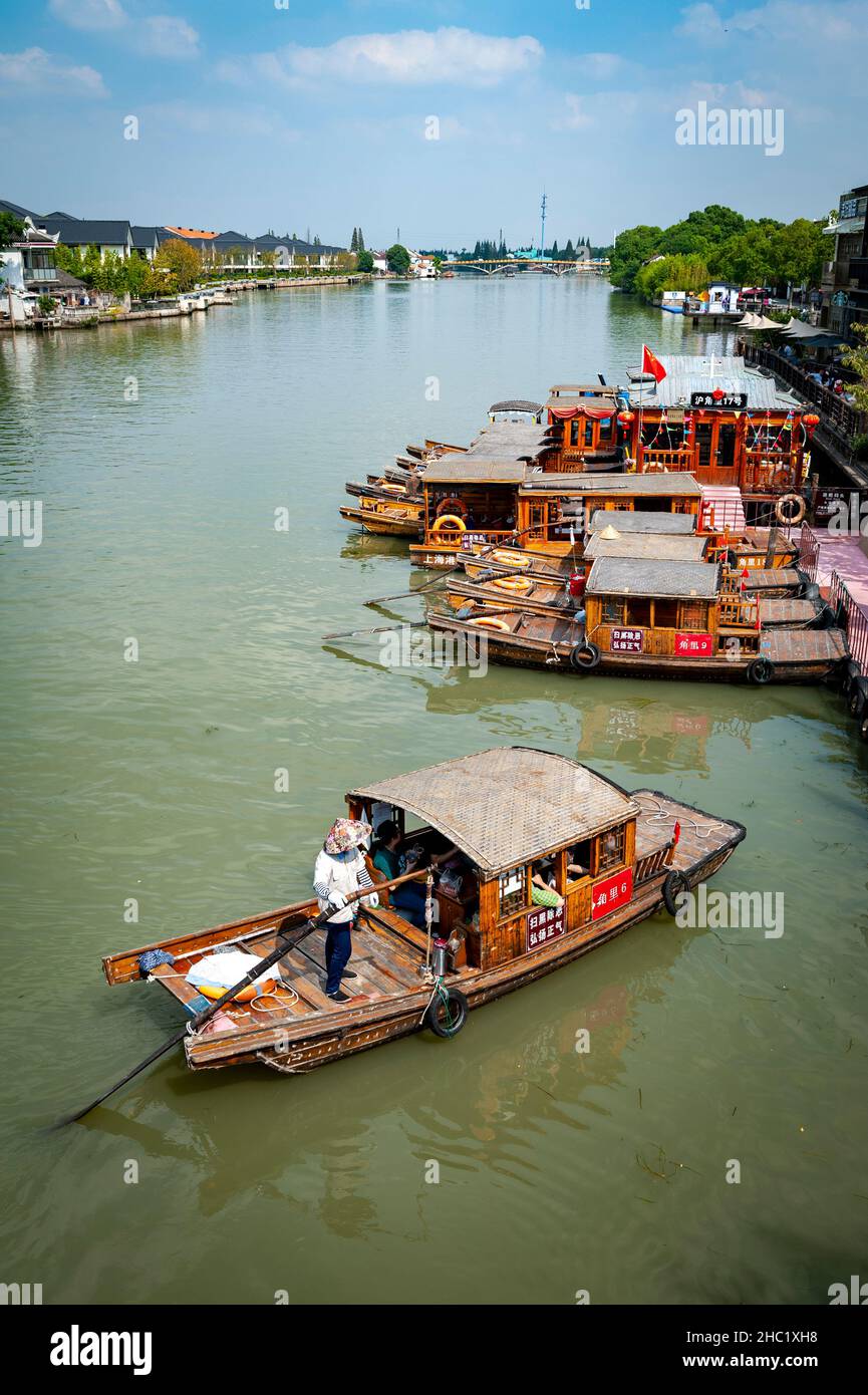 Chinese traditional rowboat in the Dianpu River in Zhujiajiao Ancient ...