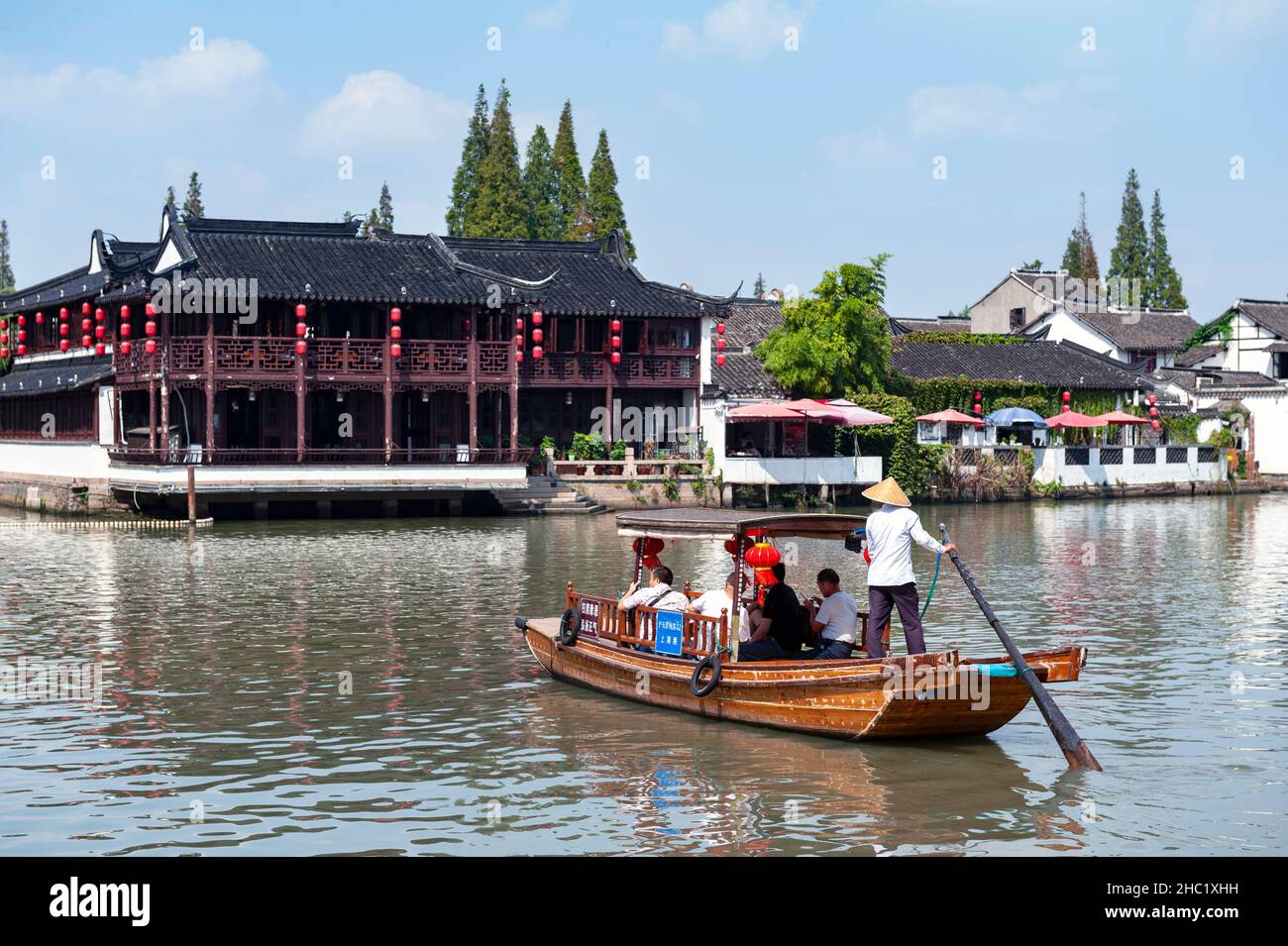 Chinese traditional rowboat in the Dianpu River in Zhujiajiao Ancient ...