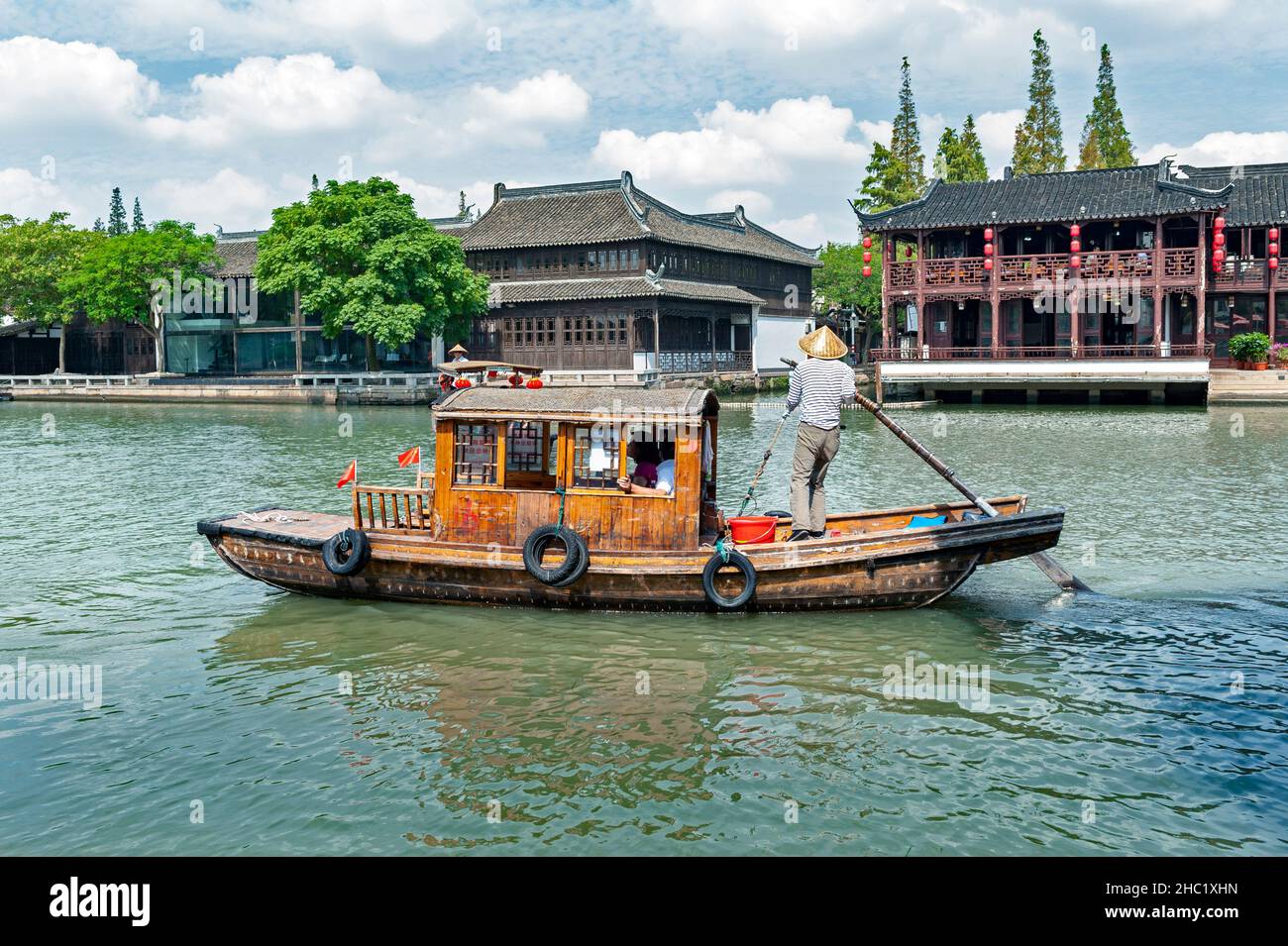 Chinese traditional rowboat in the Dianpu River in Zhujiajiao Ancient ...