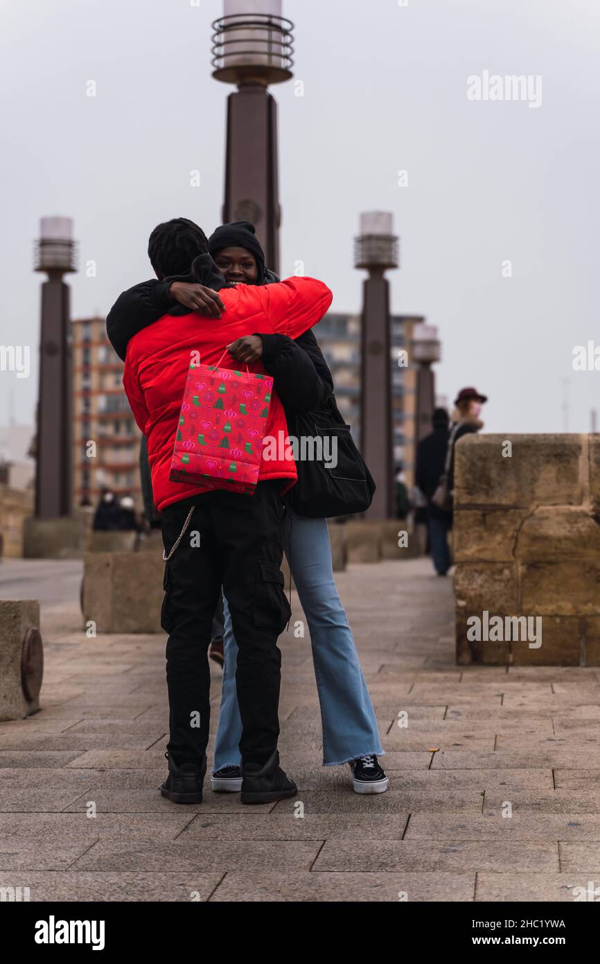 couple hug on the street Stock Photo - Alamy