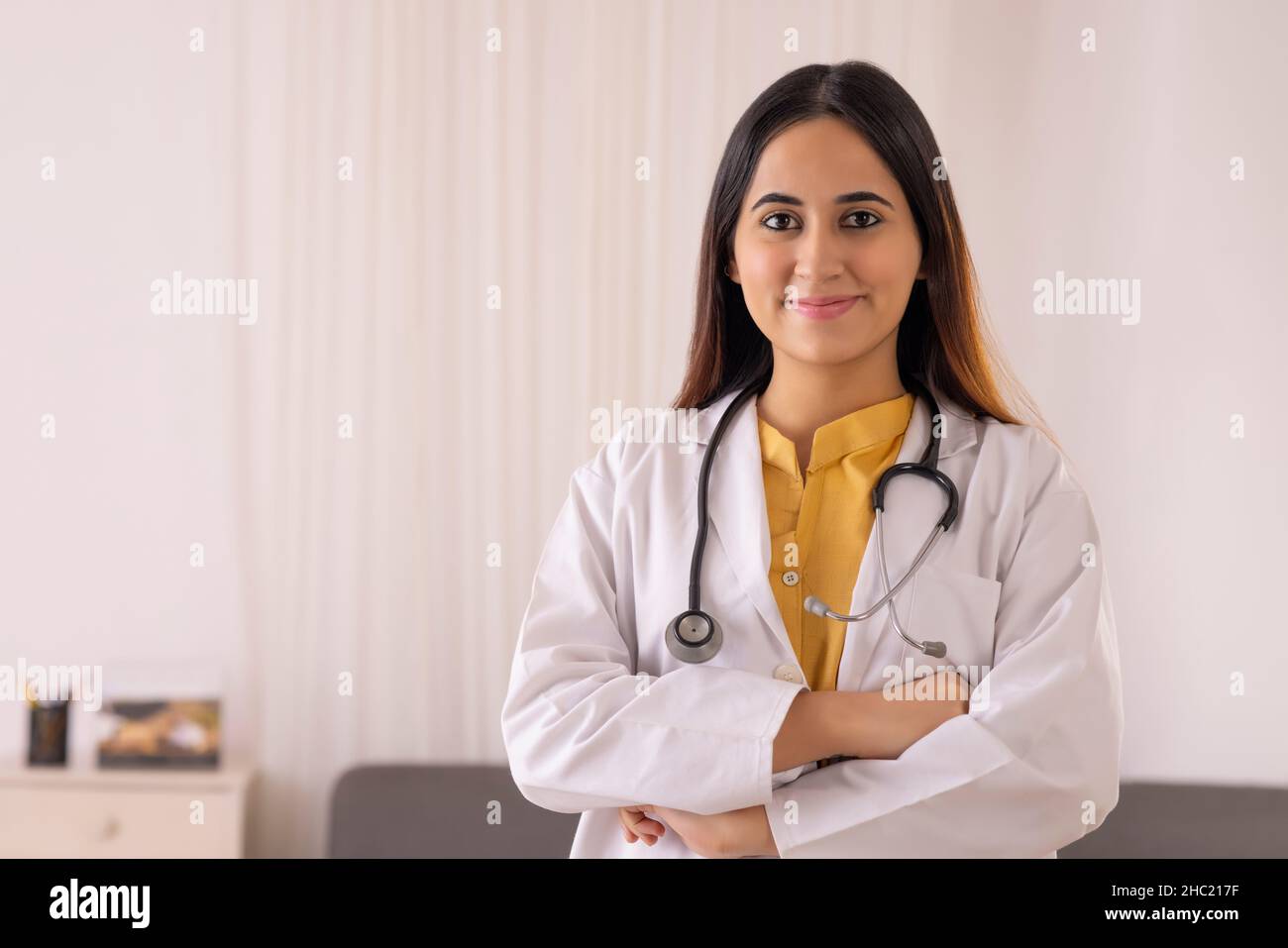 Indian woman folding her arms hi-res stock photography and images - Alamy