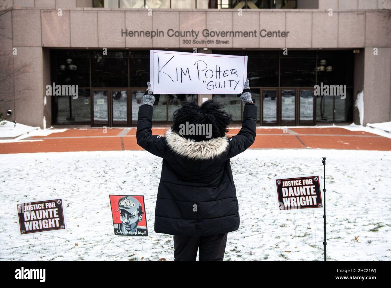 Ashley Dorelus of California protests outside the Hennepin County ...