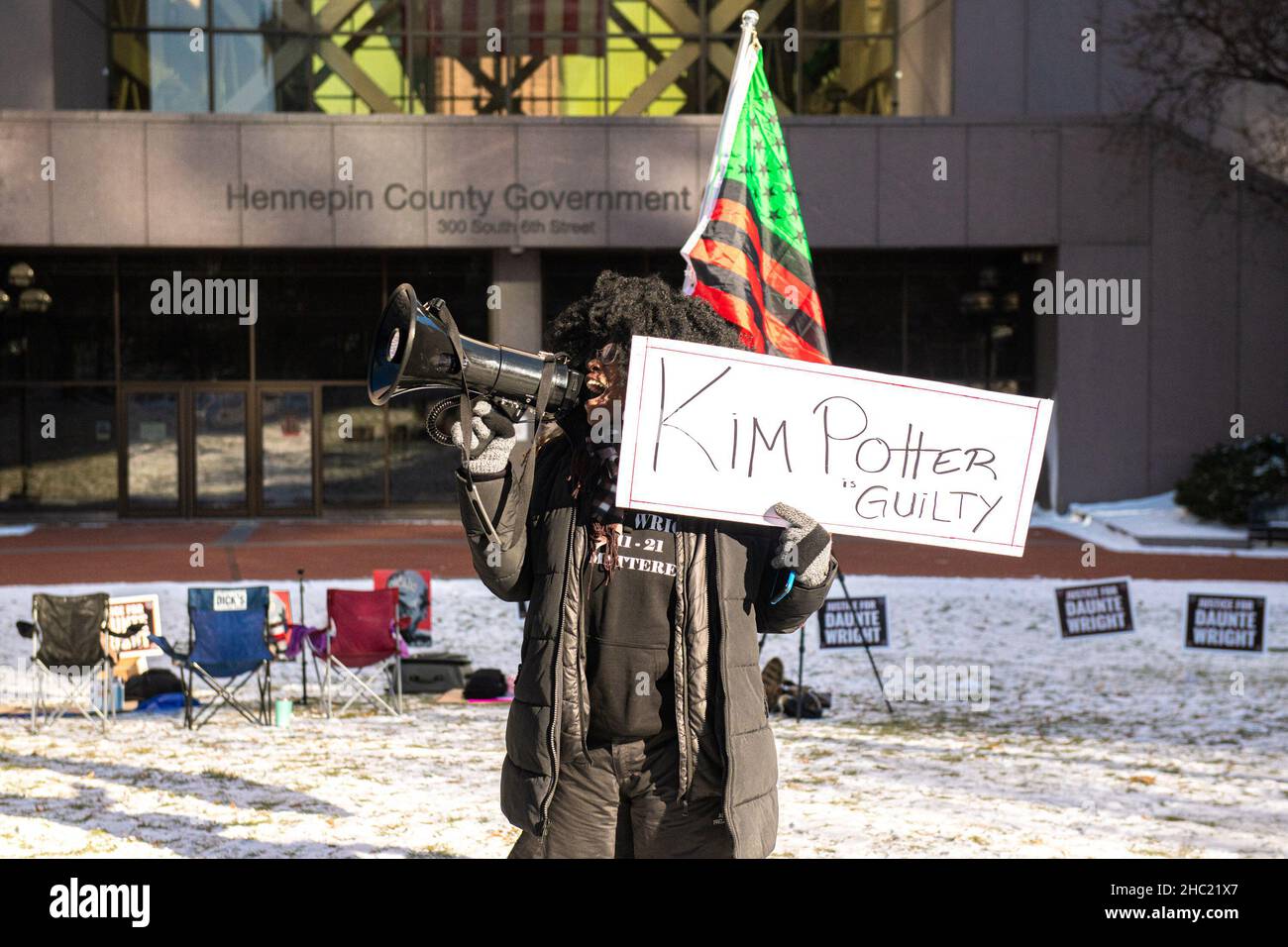 Ashley Dorelus of California protests outside the Hennepin County ...