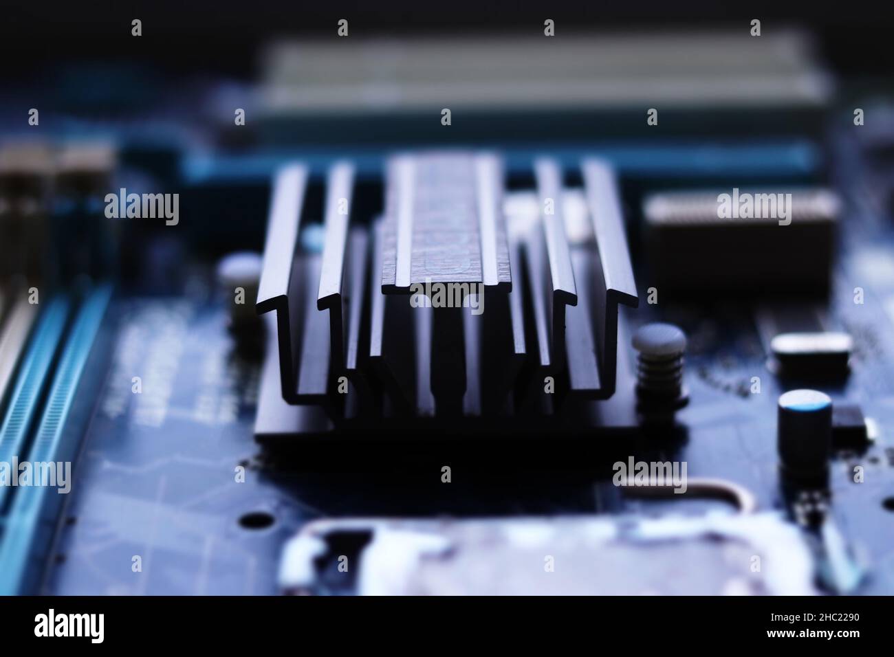 Blurred computer motherboard closeup in tilt shift style with selective ...