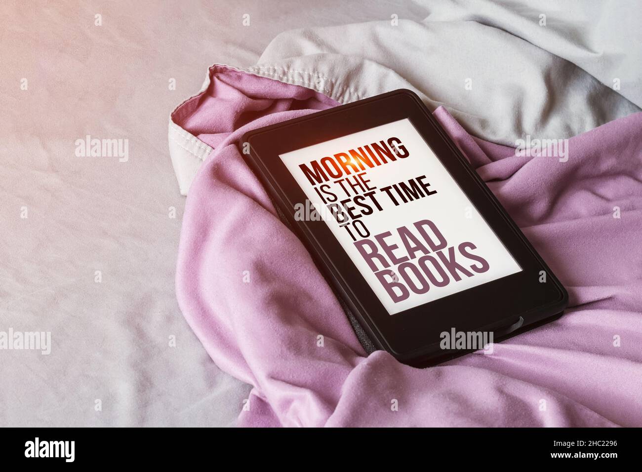 Modern e-reader electronic book with text on screen - morning is the ...